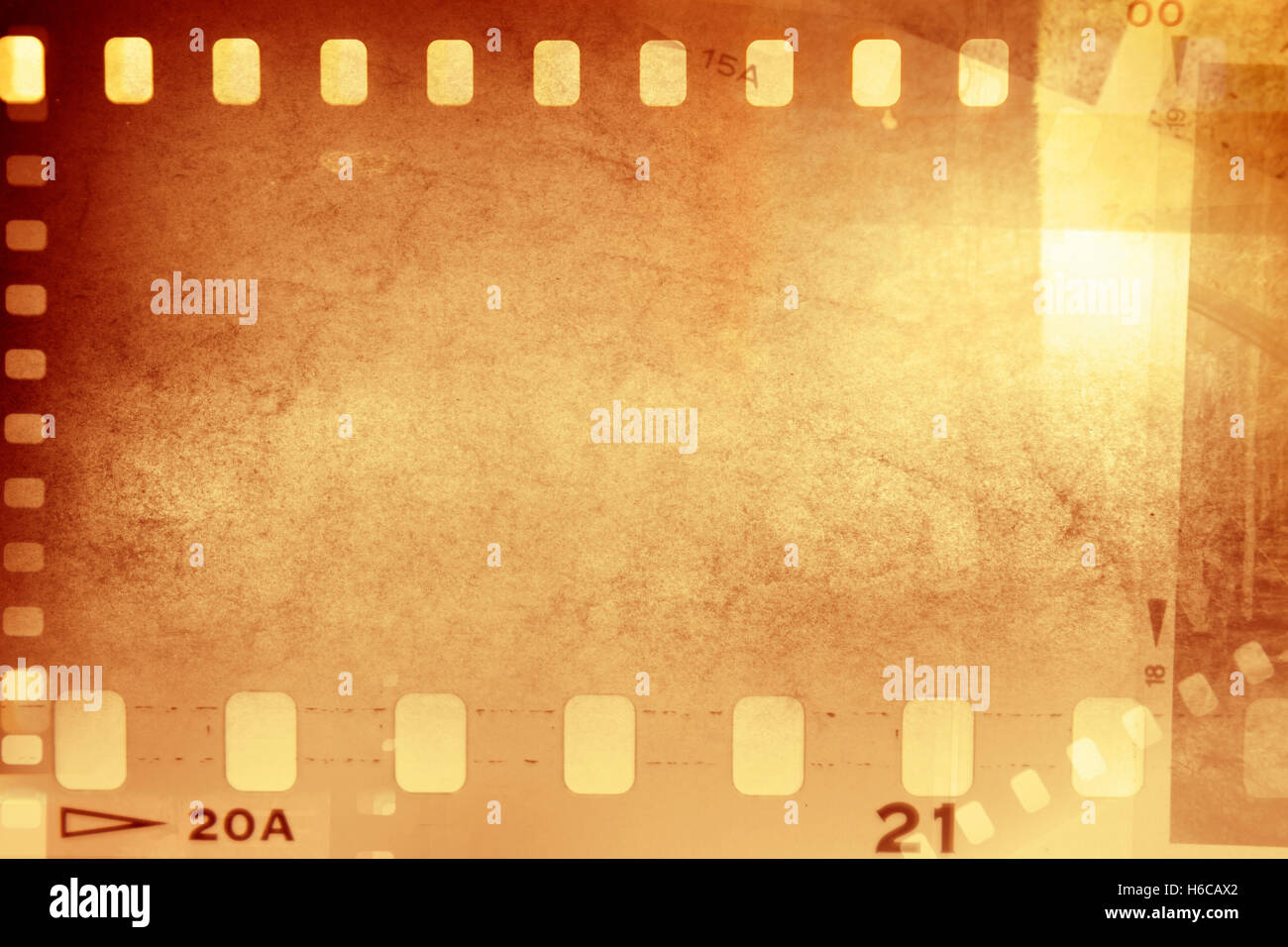 Film negative frames on orange background Stock Photo - Alamy