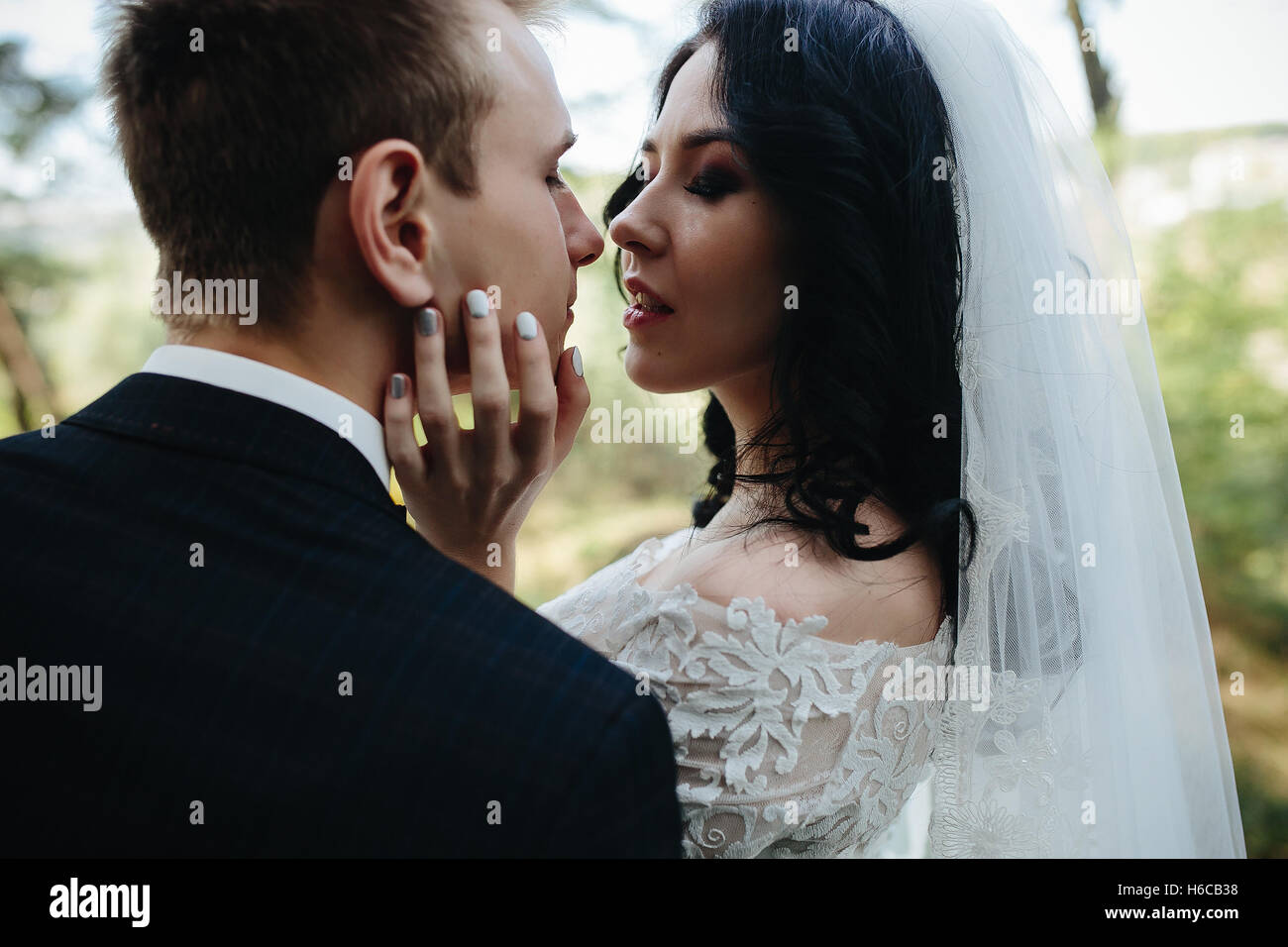 Bridal couple close to each other Stock Photo - Alamy