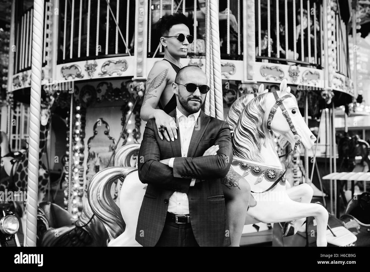 Woman riding horse on carousel Black and White Stock Photos & Images ...