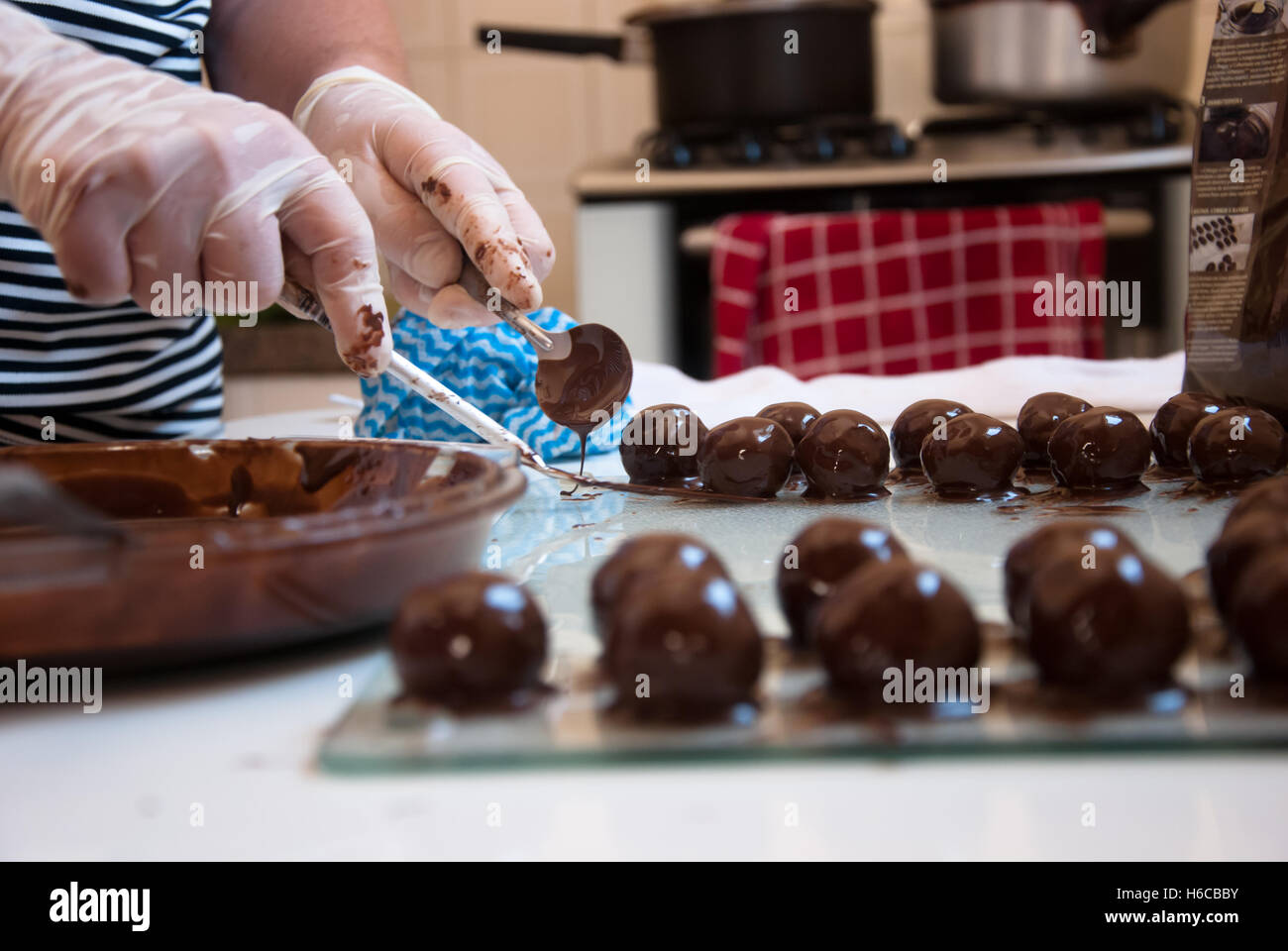 CHocolate sweets being made Stock Photo - Alamy