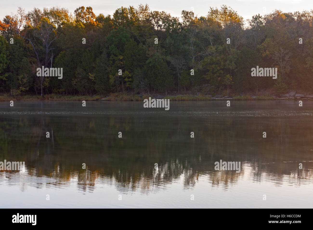 Sunrise over river Stock Photo - Alamy
