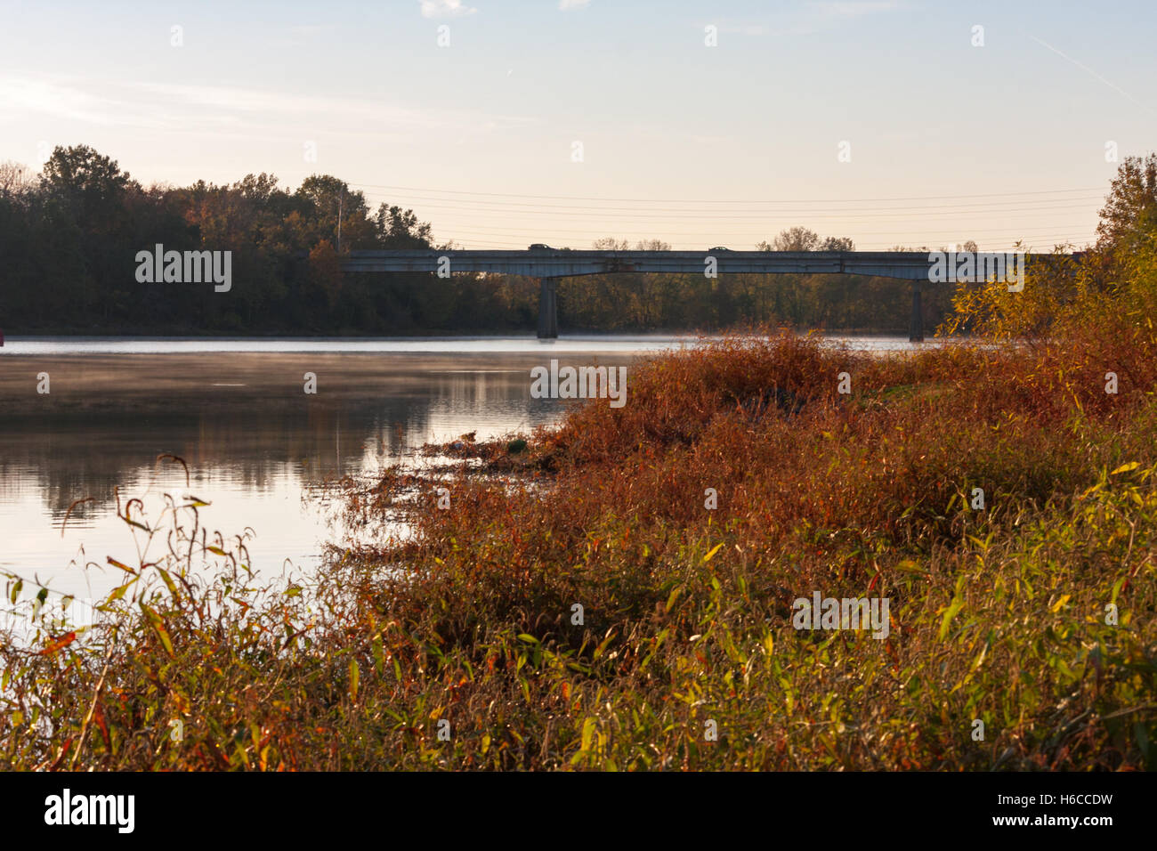 Sunrise over river Stock Photo - Alamy
