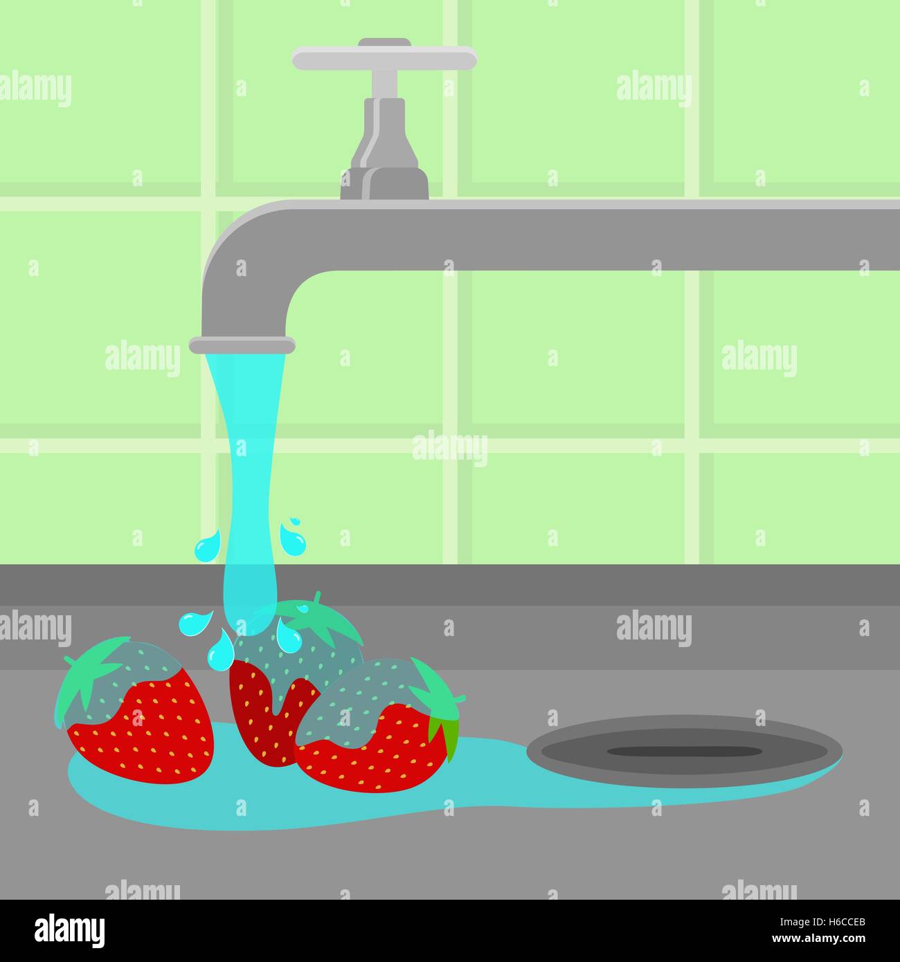 Three strawberries being cleaned and washed in a sink in a kitchen ...