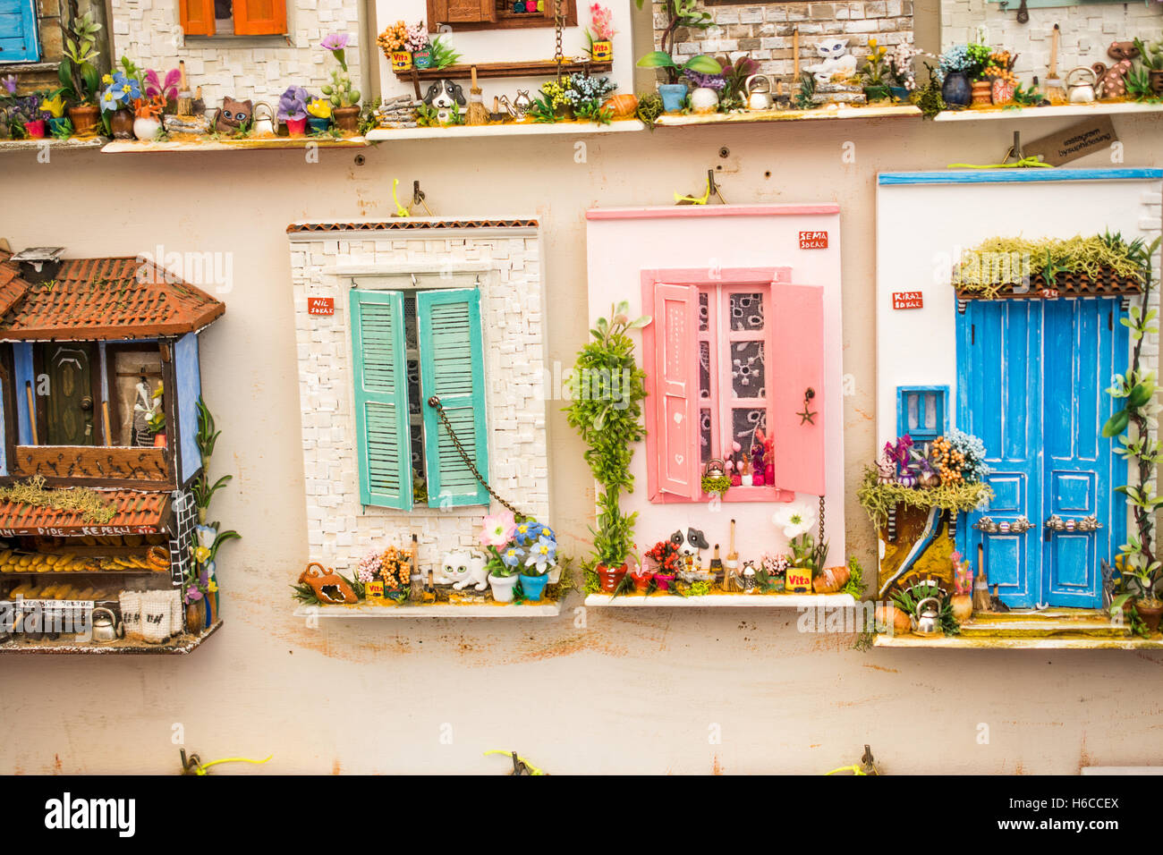 Little colorful model windows made of wood Stock Photo - Alamy