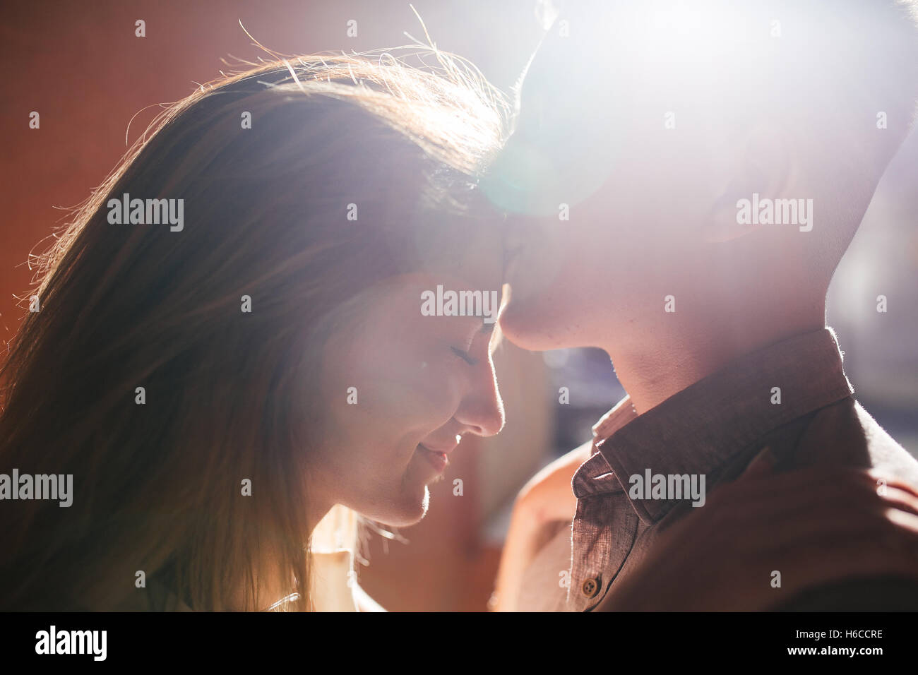 couple facing each other Stock Photo - Alamy