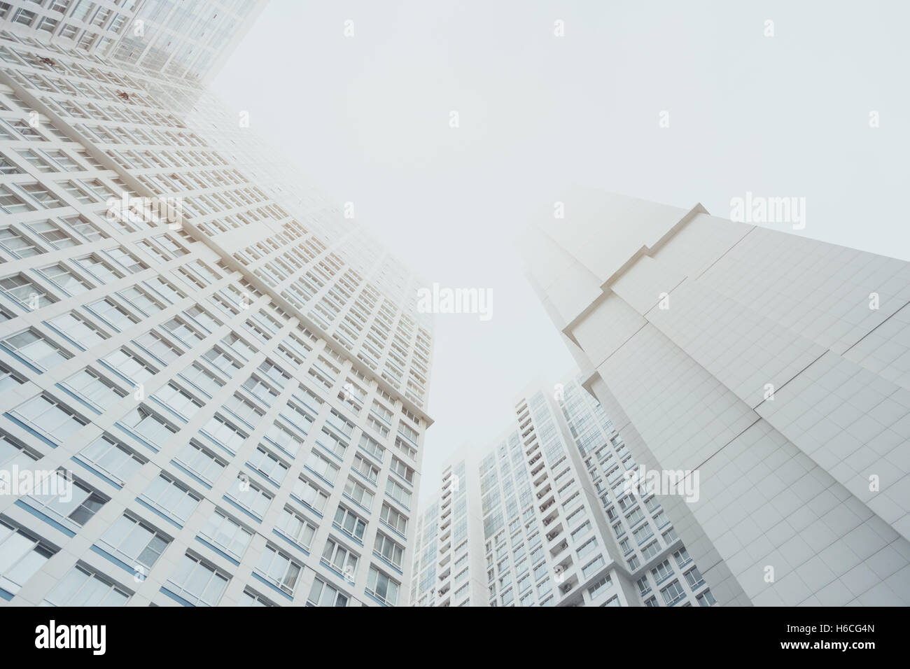 White contemporary residential skyscraper apartment building in Moscow ...