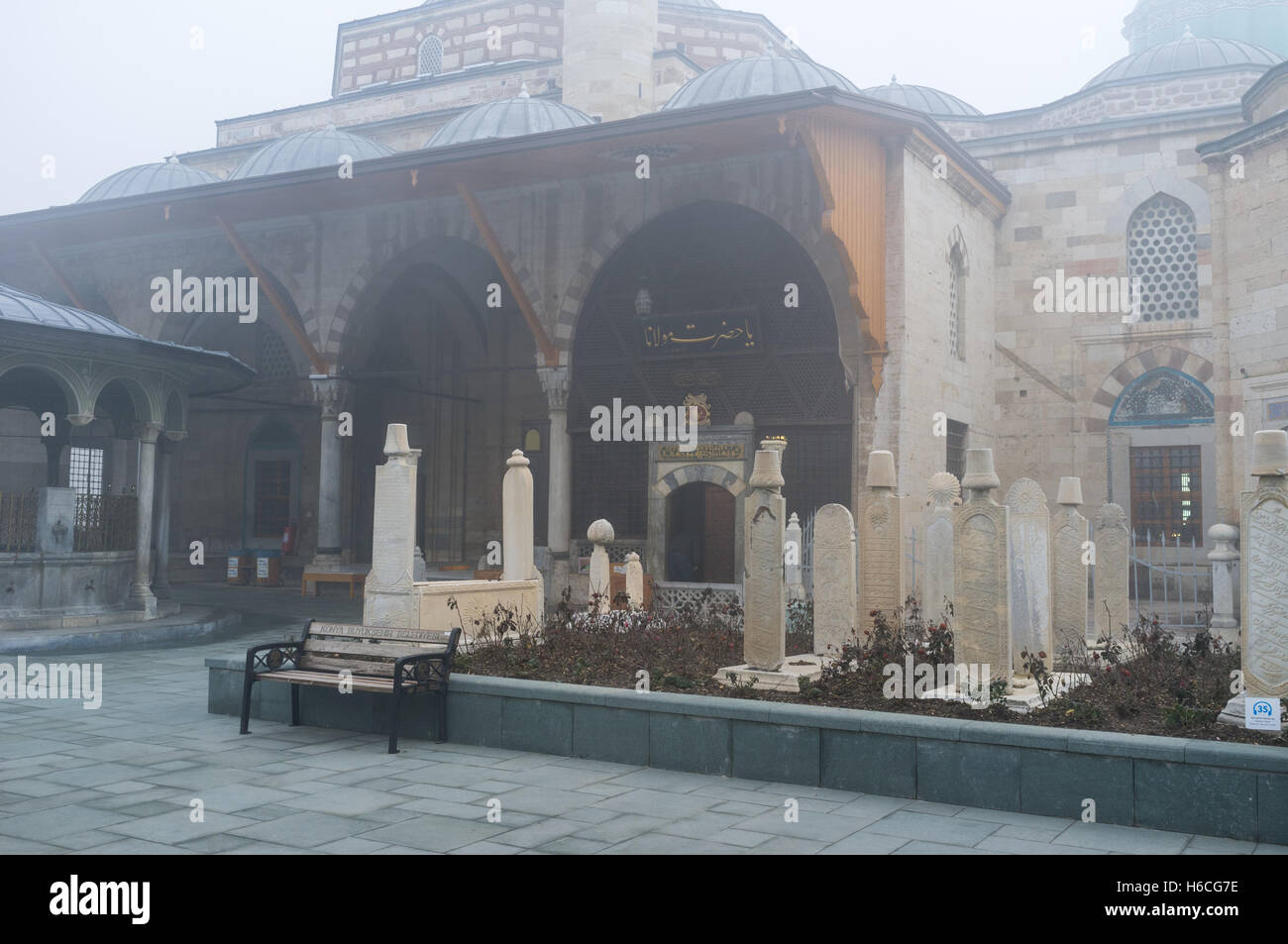 The small cemetery with old stone tomb stones located in front of the ...