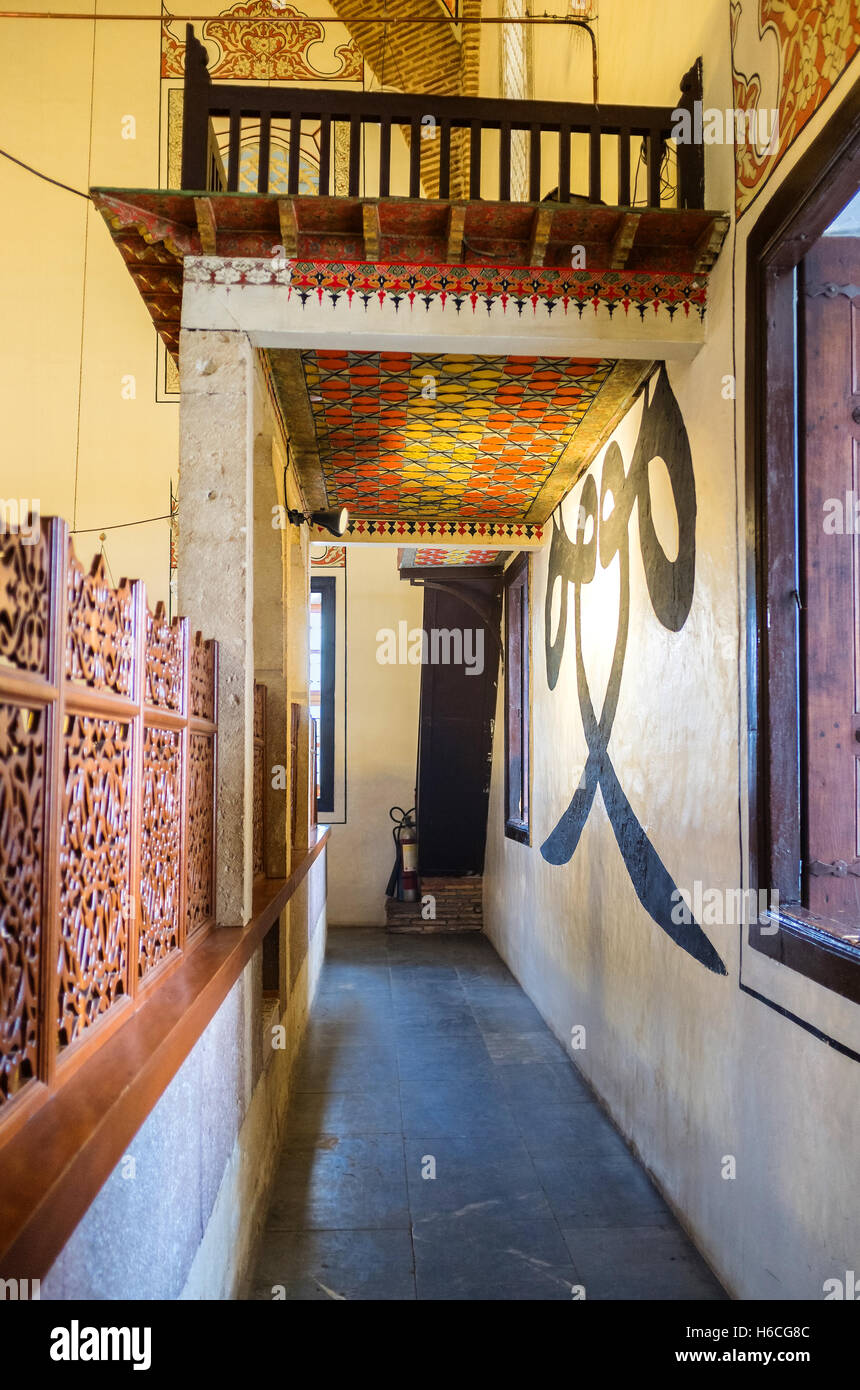 The narrow corridor leads to the prayer hall of the mosque in Mevlana ...