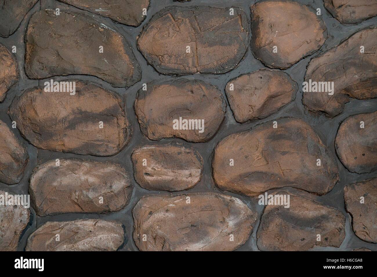 Wall round stone rock texture Stock Photo - Alamy