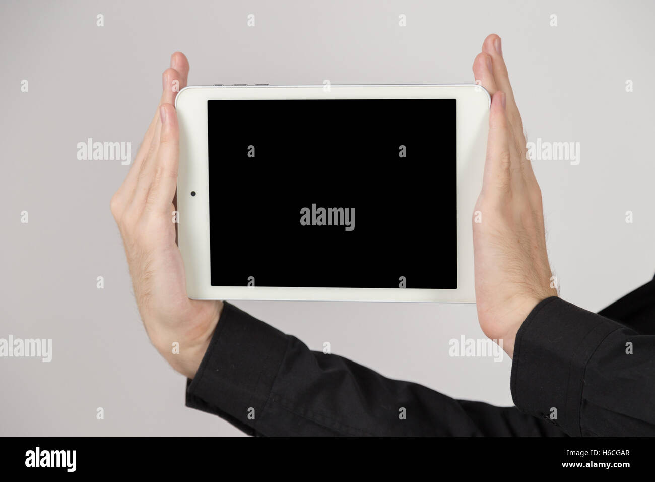 Hand businessman showing tablet screen hi-res stock photography and ...