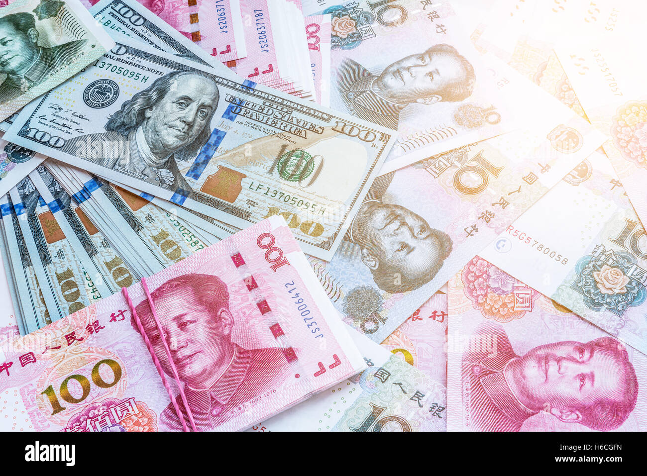 China and USA money bank notes and sunlight Stock Photo - Alamy