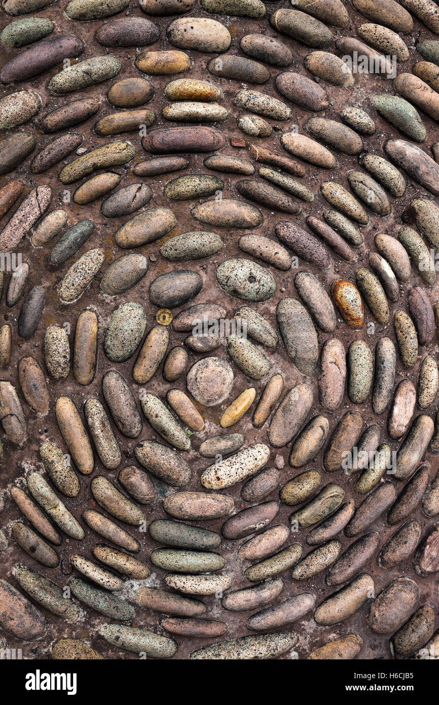 pavement from the beautiful pebbles as background Stock Photo - Alamy