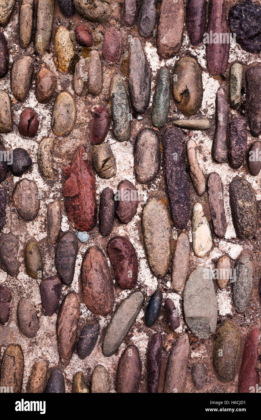 sidewalk from the beautiful pebble as background Stock Photo - Alamy