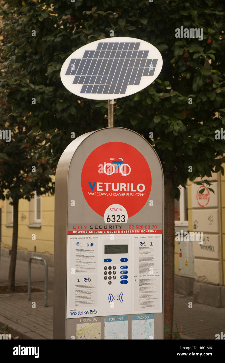 EUROPE, POLAND, Warsaw, Nowy Swiat, bicycle rental machine powered by ...