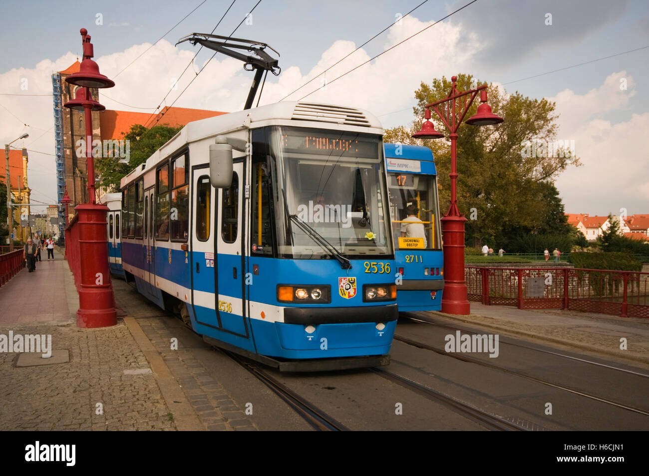 EUROPE, POLAND, Wroclaw, Wrocław, trams on bridge crossing the River ...
