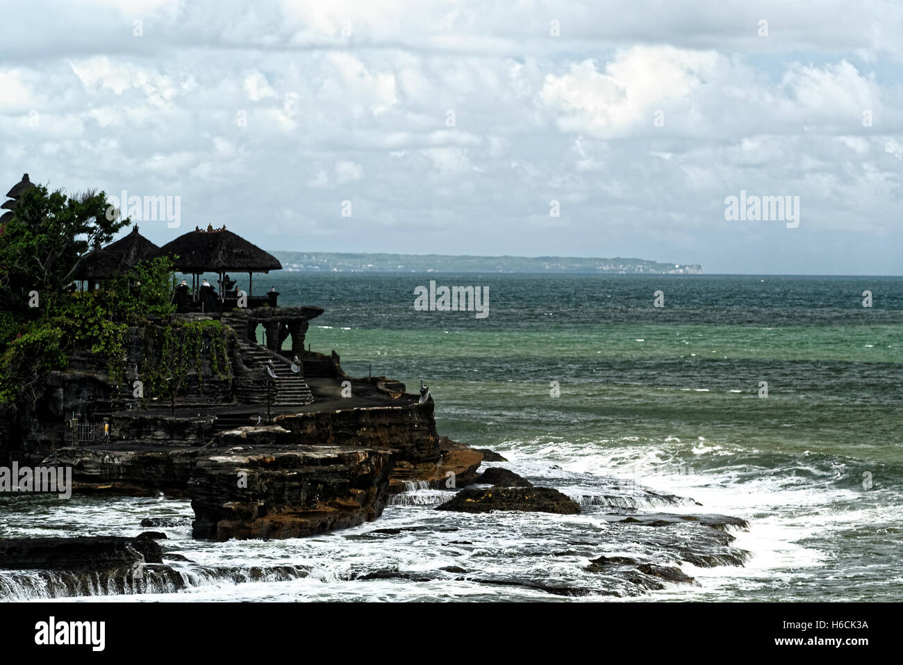 Tanah Lot Temple and the Waves Stock Photo - Alamy