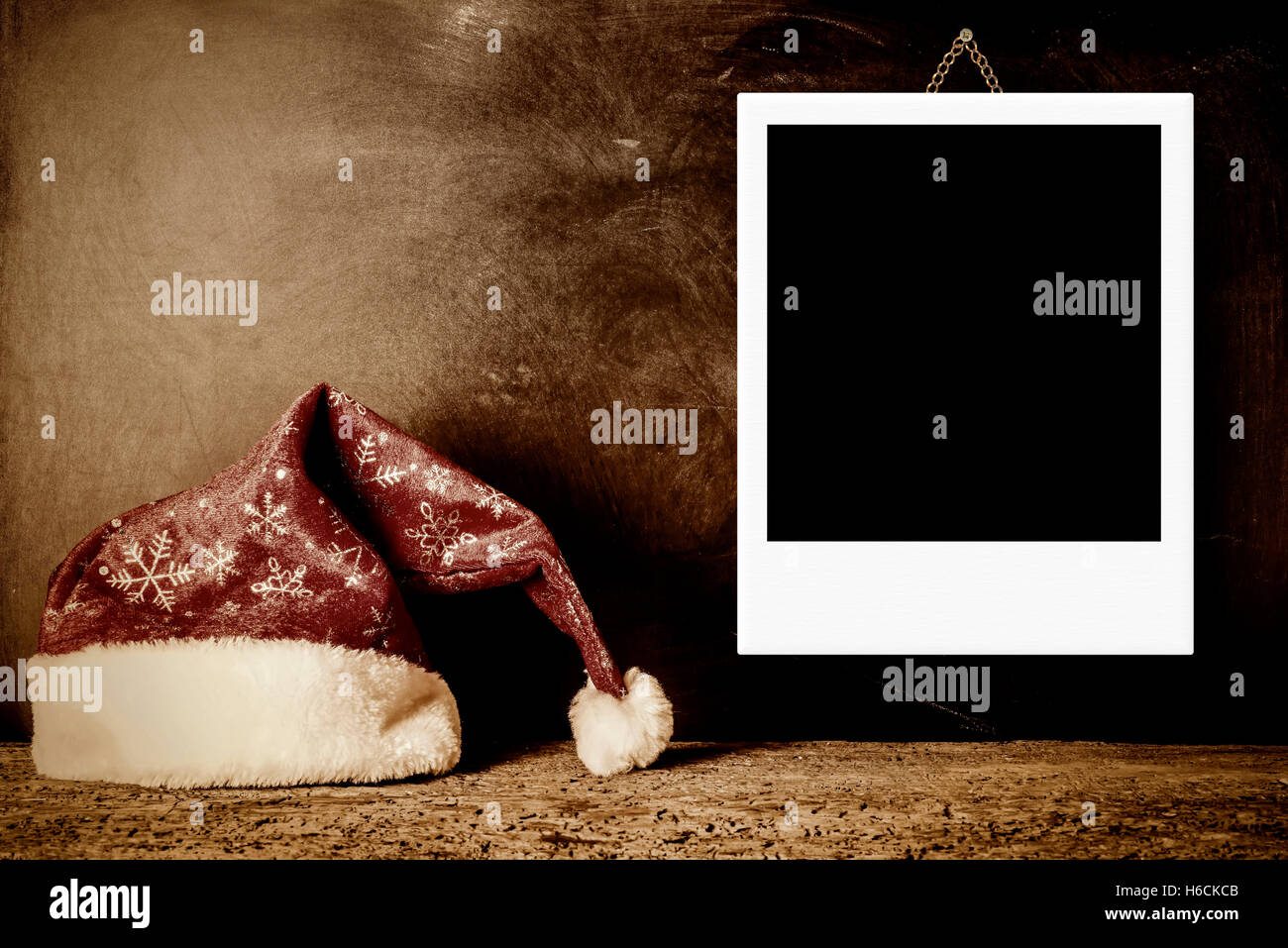 Christmas cards, vintage Santa hat with one empty picture frame and ...