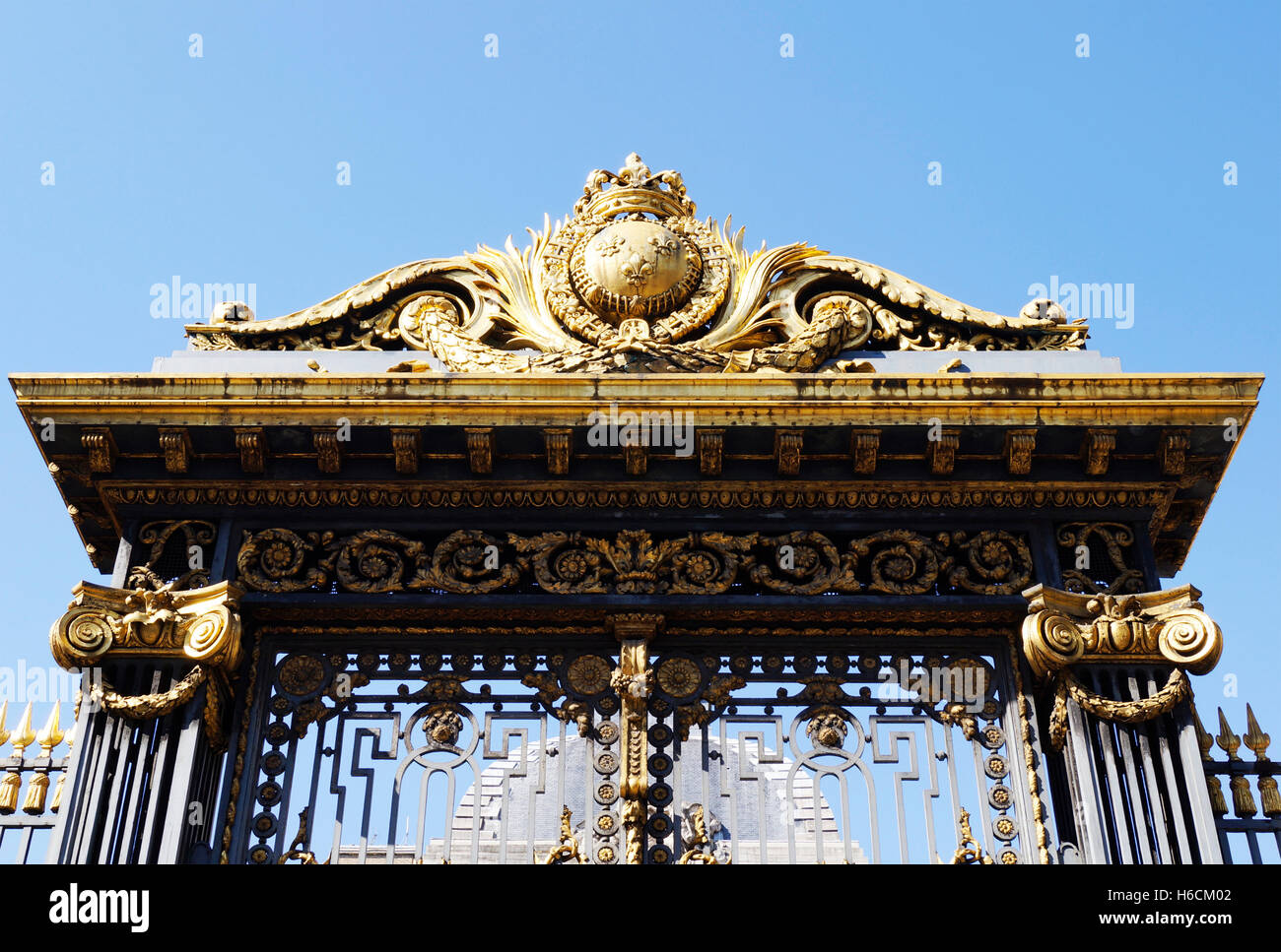 Golden decoration on main gate of Palace of Justice (Palais de Justice ...