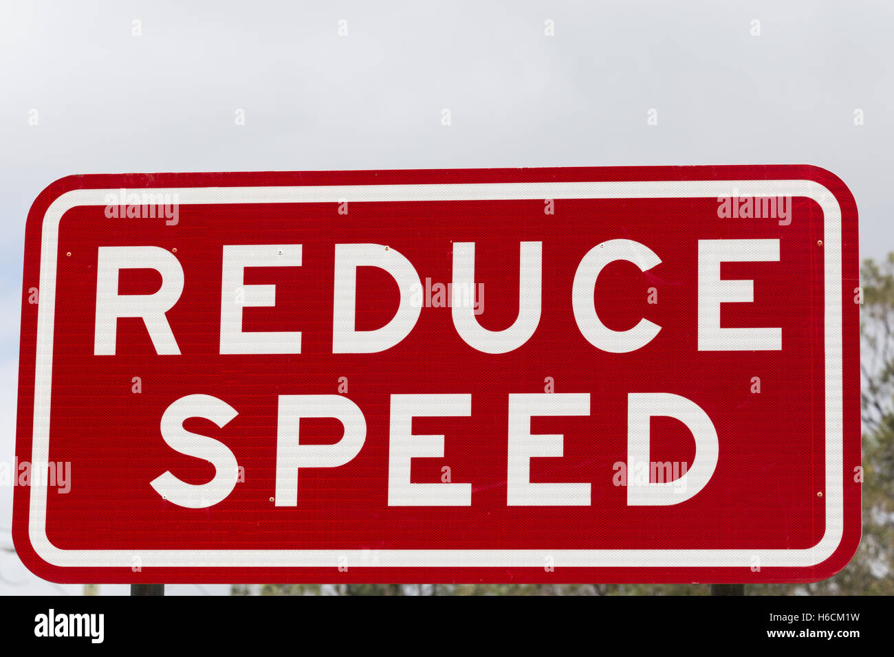 Reduce Speed Sign, Slow Down Stock Photo - Alamy