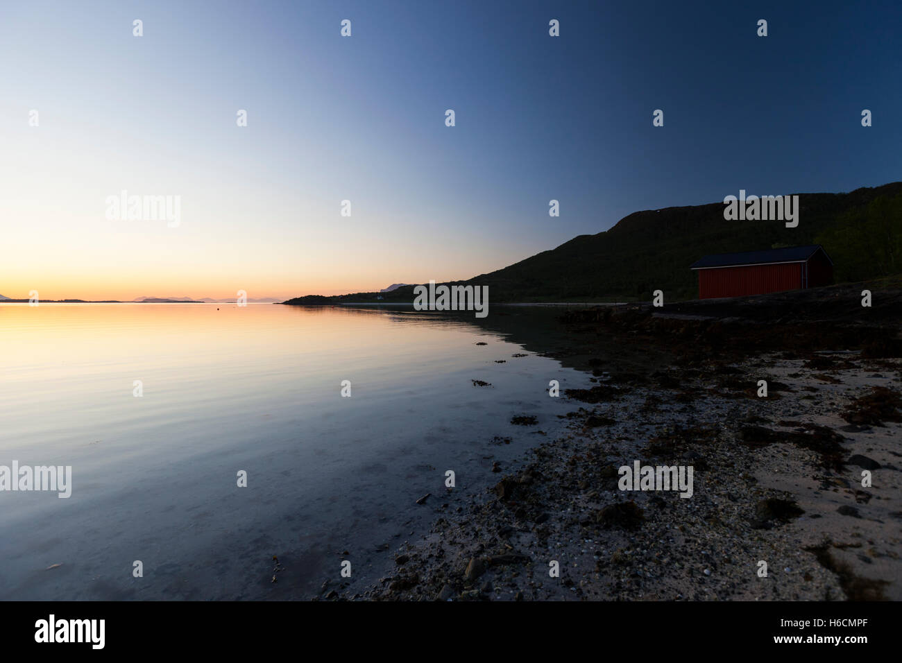 Midnight sun, Tjeldsund Fjord camping ground, Lofoten Islands, Norway ...