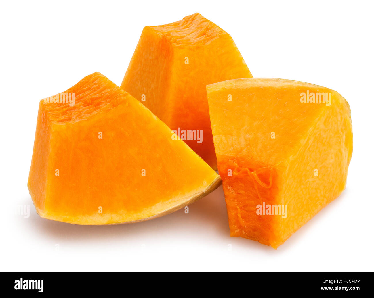 sliced pumpkin chunks isolated Stock Photo - Alamy