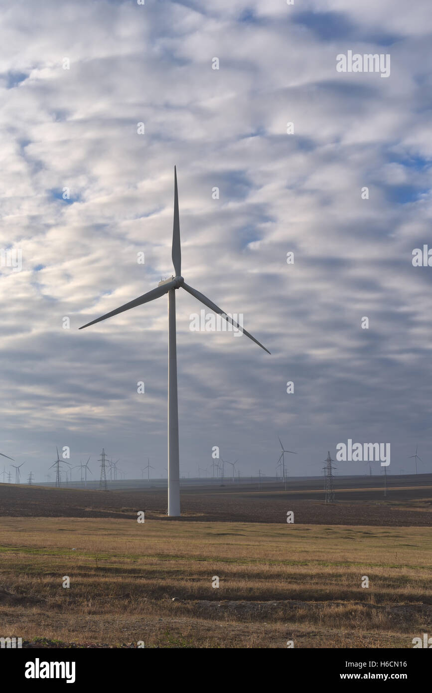 Eolian field and wind turbines farm on a cloudy day Stock Photo - Alamy