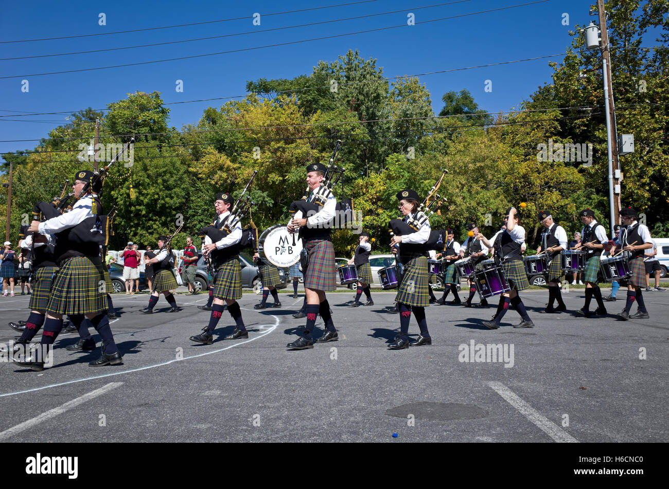 Pipe band marching in the Celtic Classic Stock Photo - Alamy