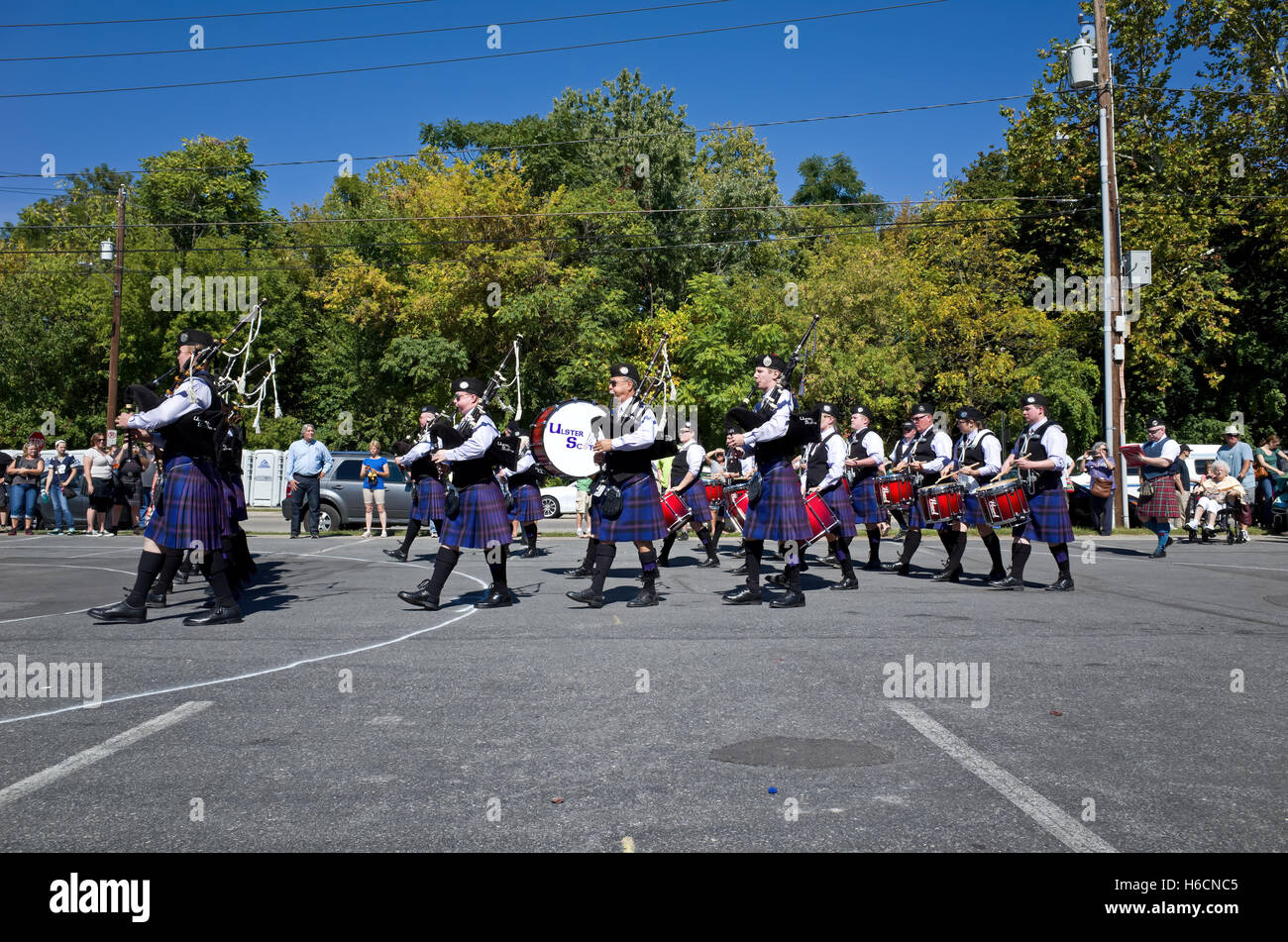 Pipe band marching in the Celtic Classic Stock Photo - Alamy