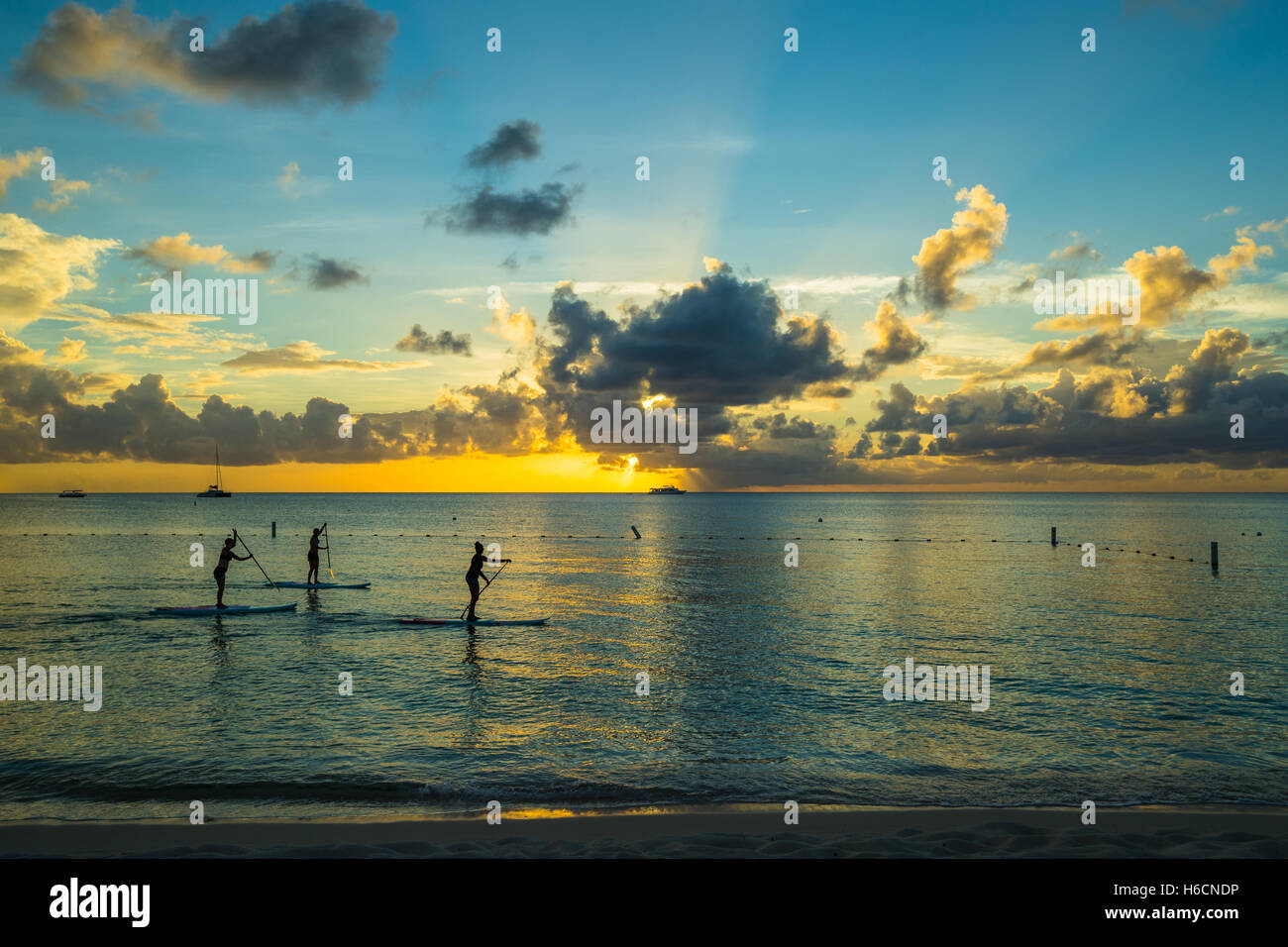 sunset over tropical seas Stock Photo - Alamy