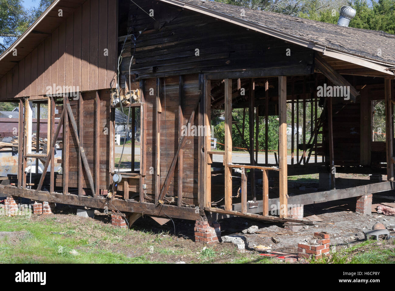 Scrapping an old home for materials Stock Photo - Alamy