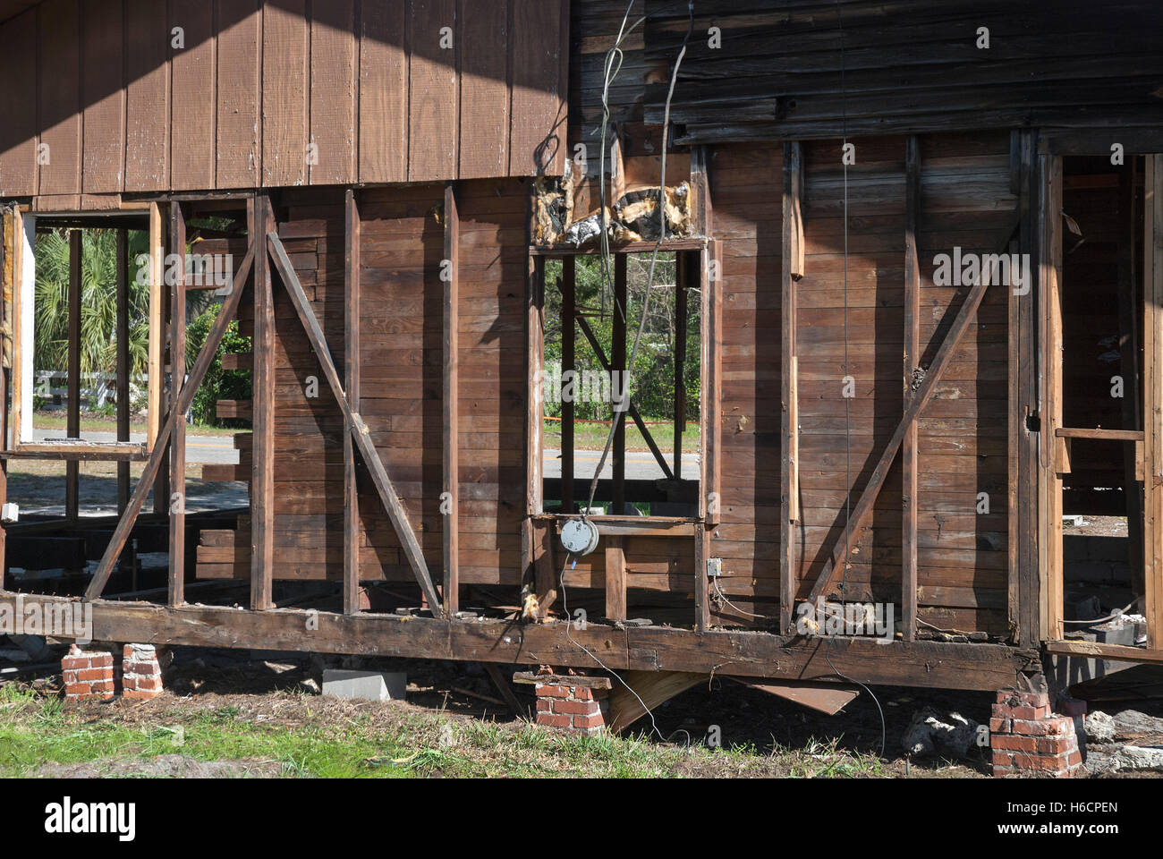 Scrapping an old home for materials Stock Photo - Alamy