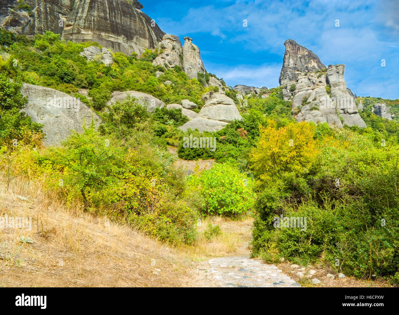 The suny valley, surrounded by Meteora mountains and green forest ...
