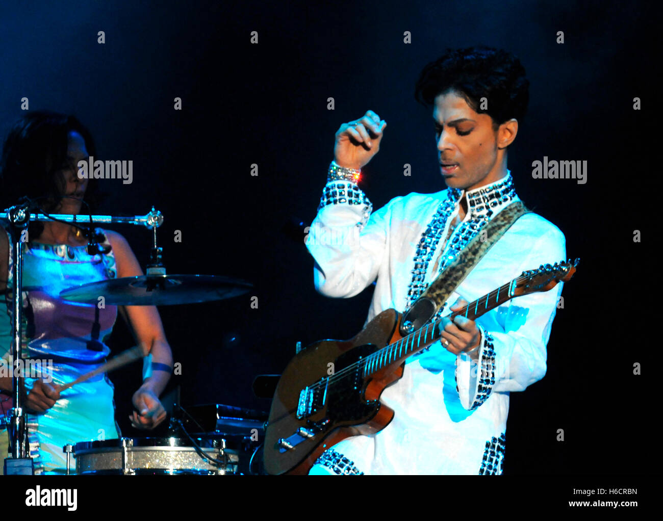 Prince performing live at the 2008 Coachella music festival in Indio ...