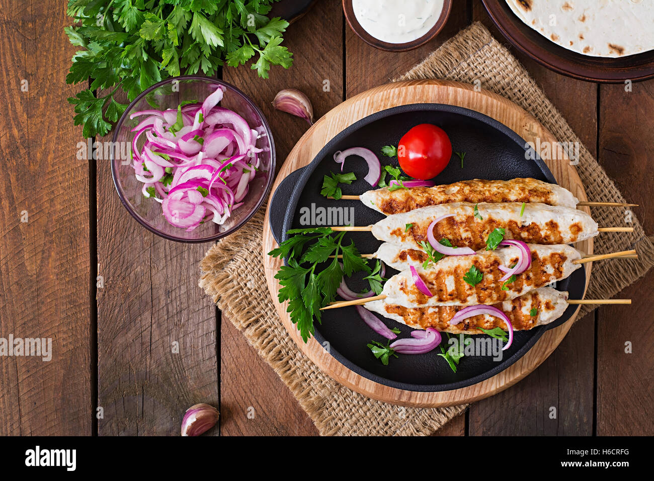 Chicken kebab with grilled vegetables. Top view Stock Photo - Alamy
