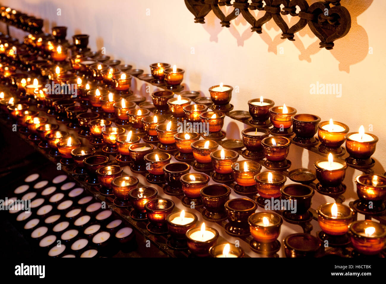 Votive candles in the Wallfahrtskirche Mary Eck sanctuary, burning ...