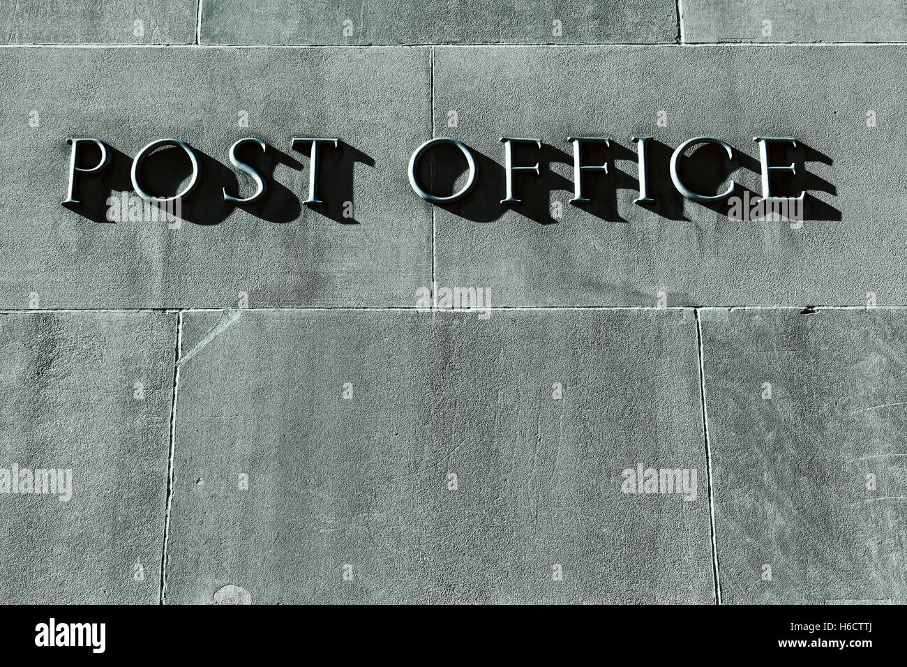 Letters on a wall depict it is the Post Office Stock Photo - Alamy