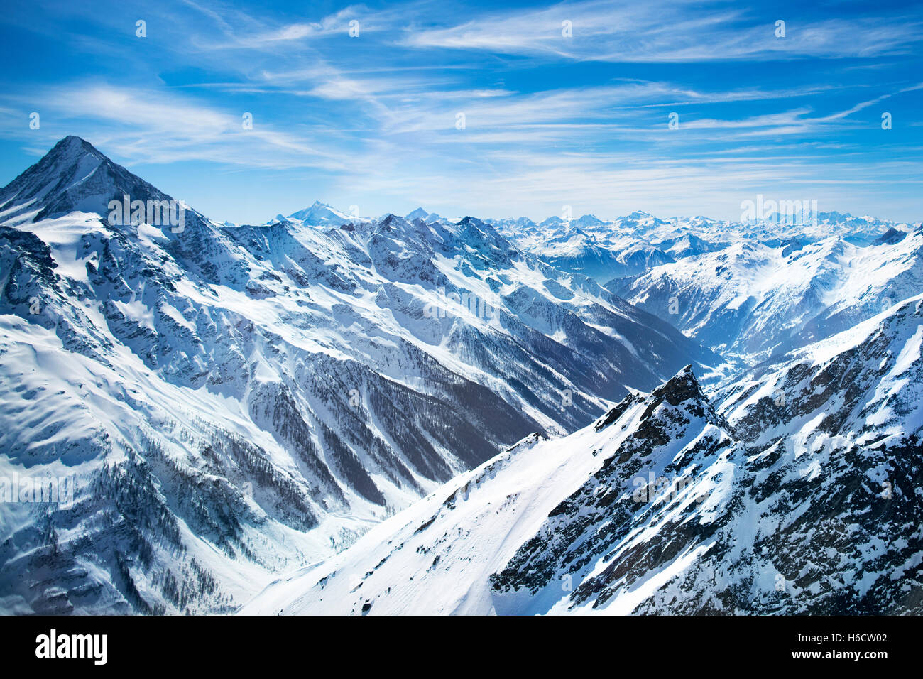 Aerial view of the Alps mountains in Switzerland. View from helicopter ...
