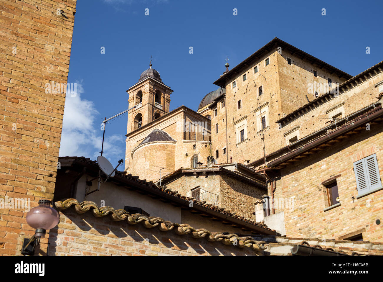 Old buildings and their roofs in Urbino, Marche, Italy. Summer sunny ...