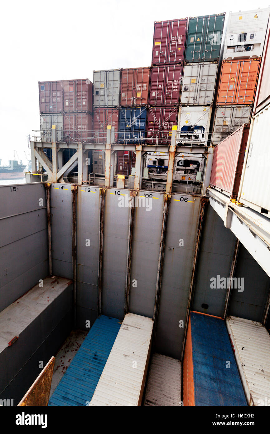 View of a freighter ship's storage compartment, half full with ...
