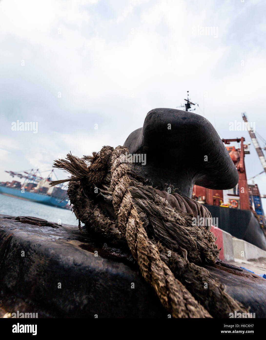 Docking freighter ships in a commercial harbor Stock Photo - Alamy