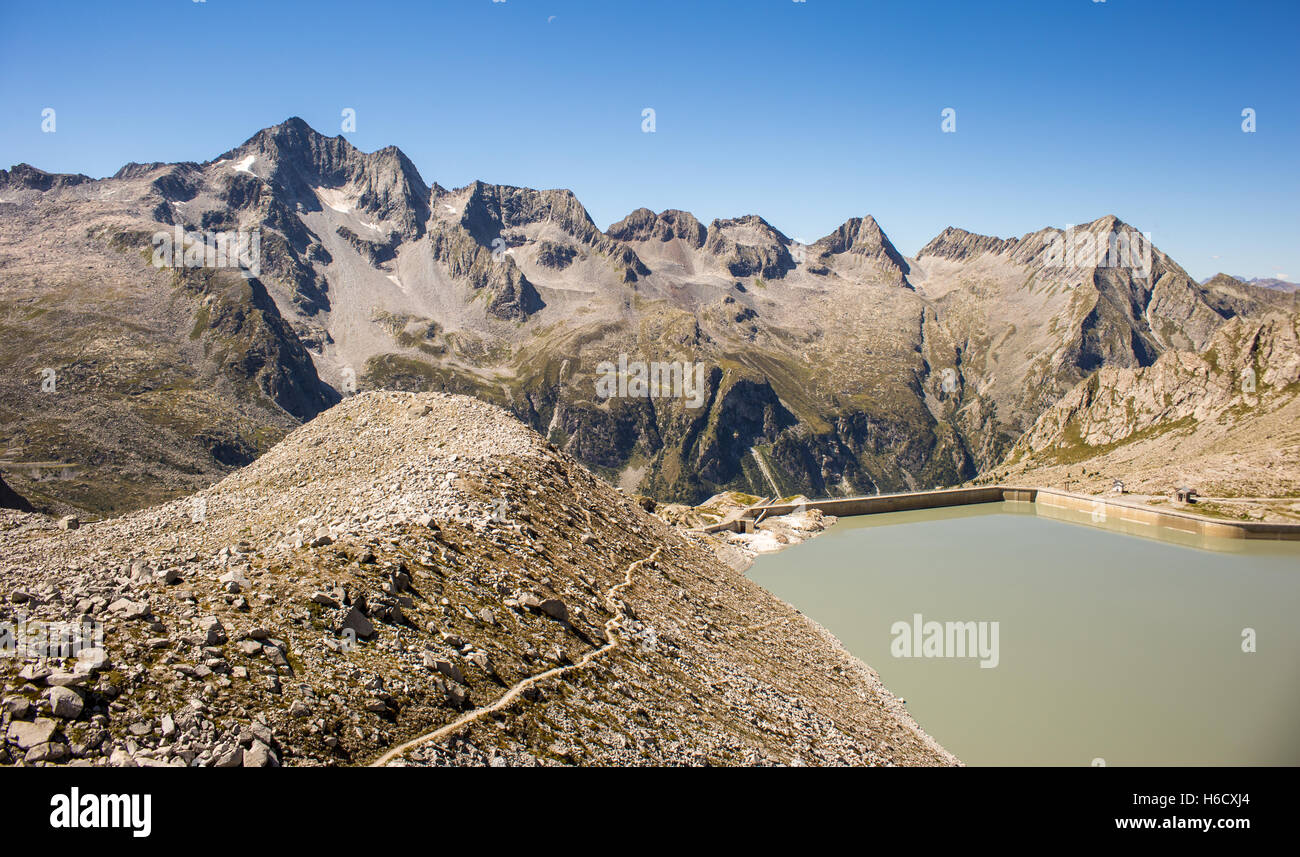 Venerocolo lake and its dam at the foot of Adamello mountain. Ponte di ...
