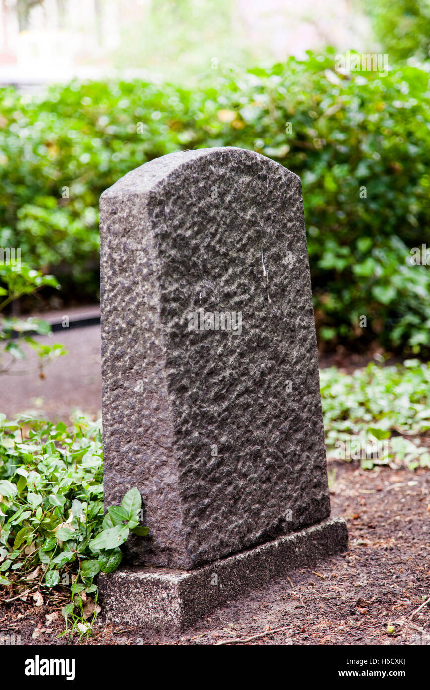 A tomb in a cemetery Stock Photo - Alamy