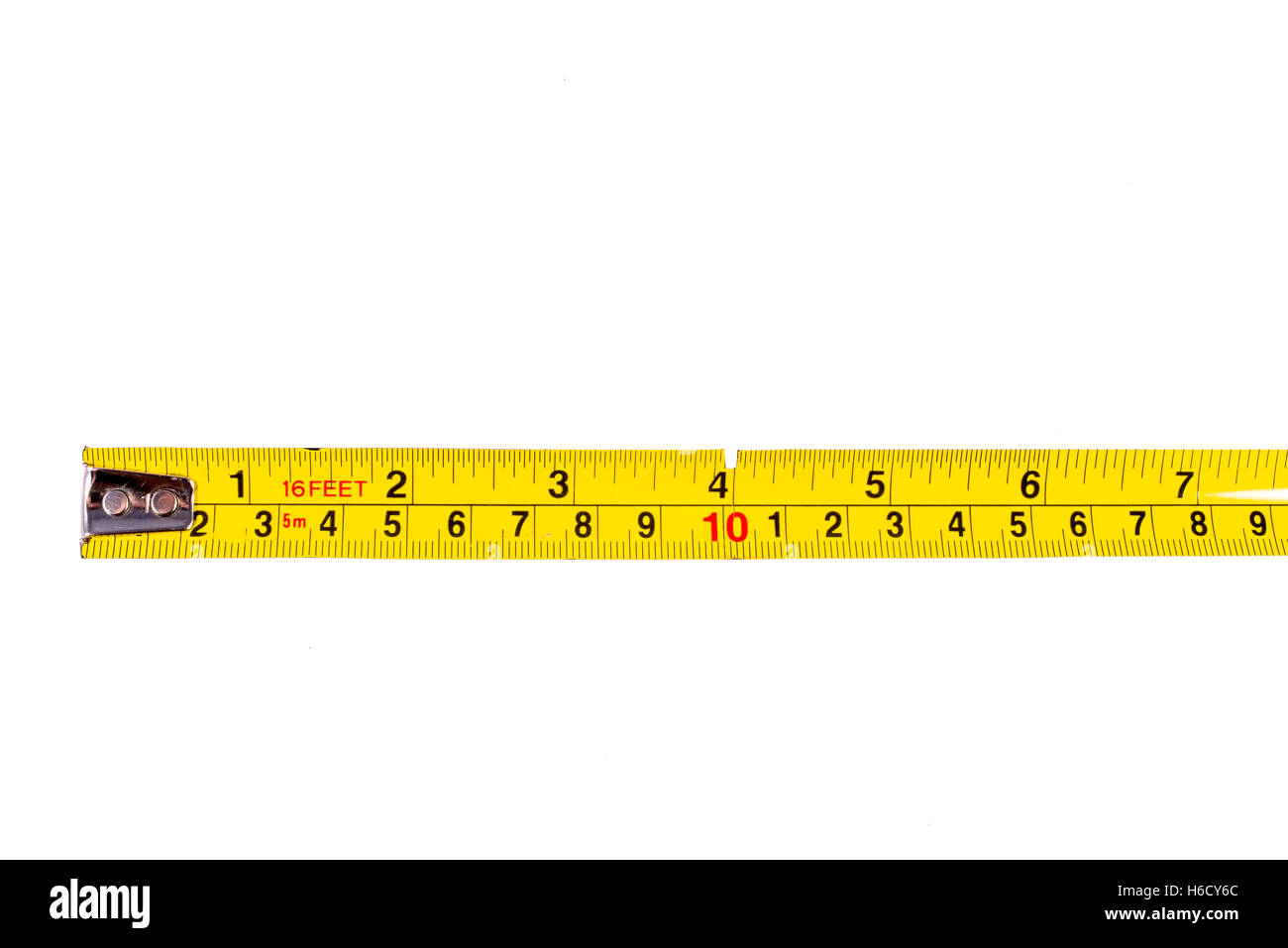 A close-up shot of a tape measure ruler over a white background Stock ...