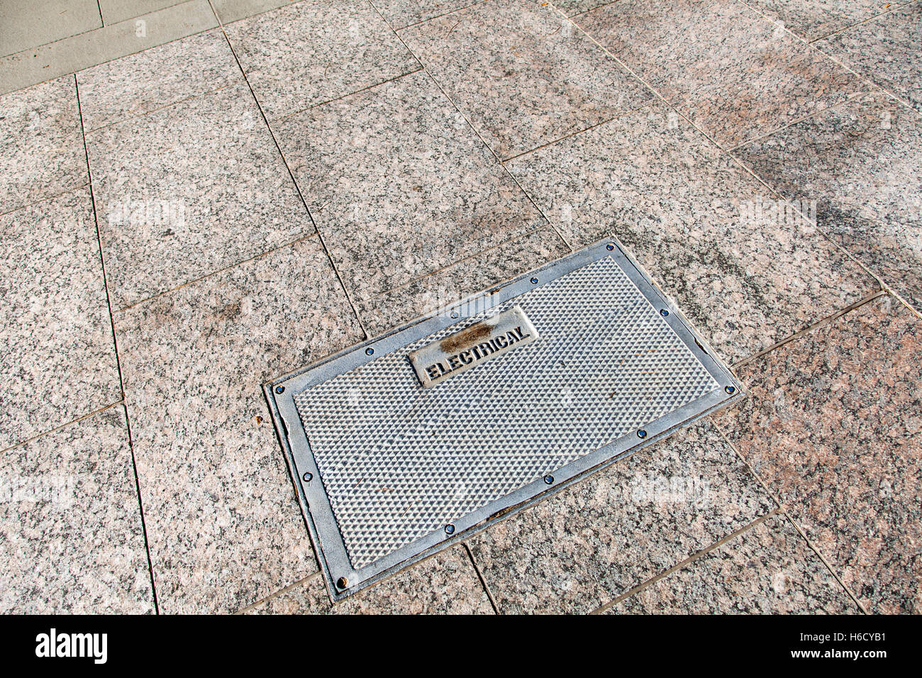 Electrical manhole cover on streets hi-res stock photography and images ...