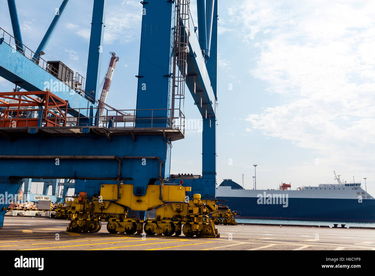 View of a freighter ship docking in a commercial harbor Stock Photo - Alamy