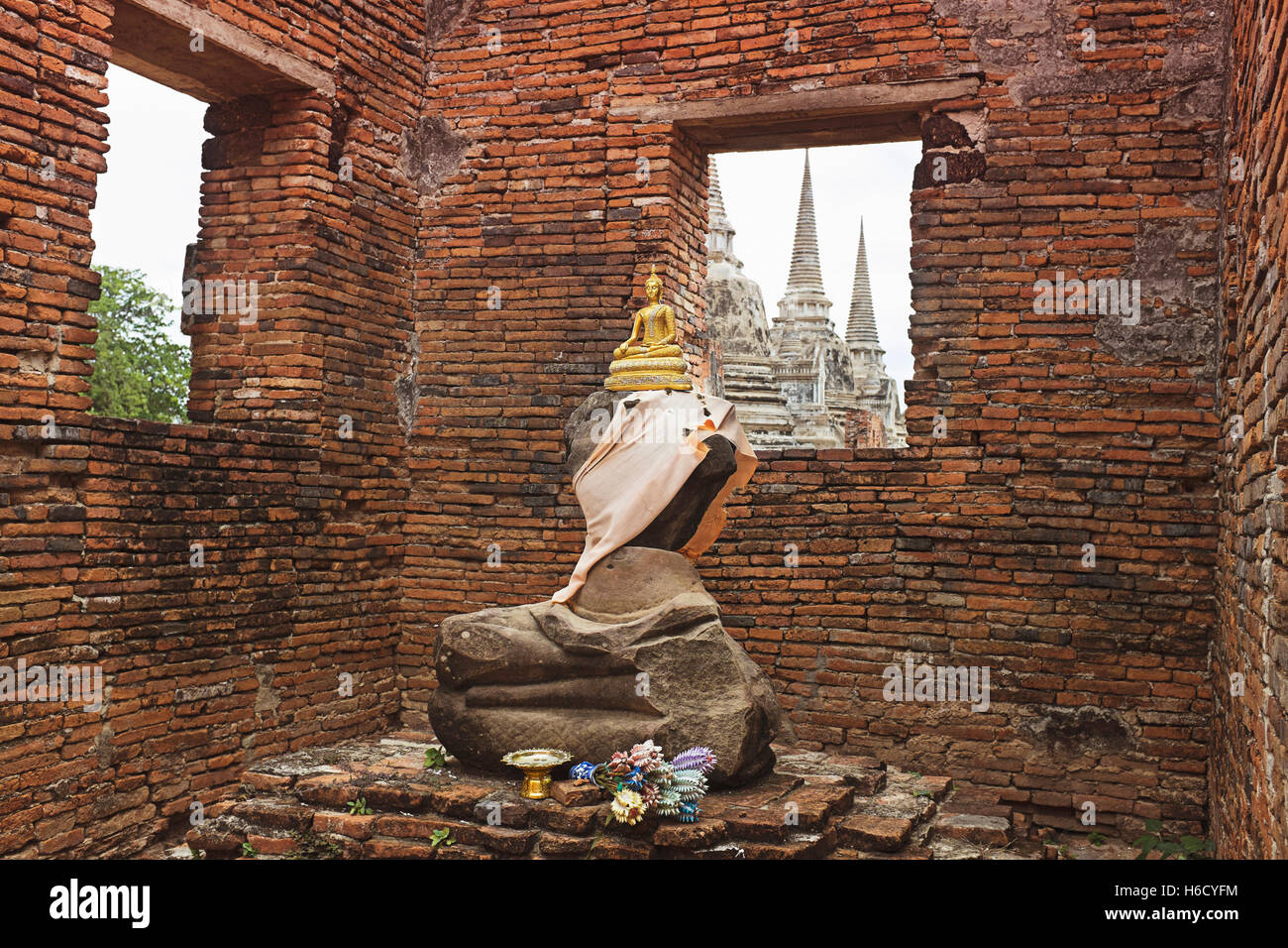 Buddhist shrine inside ruins of Thai temple Stock Photo - Alamy