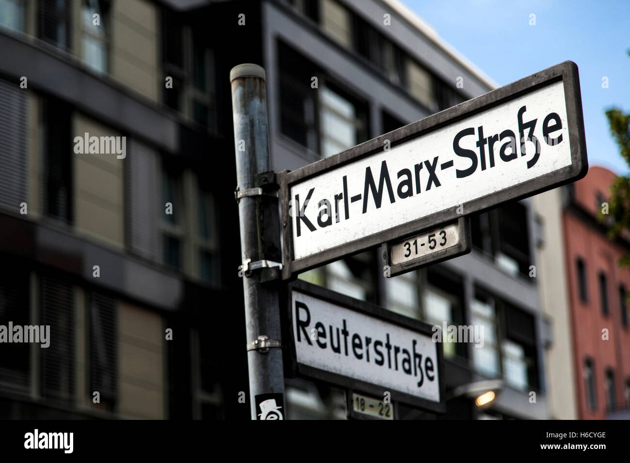 Street signs in an intersection says it is Larl-Marx Strasse and ...