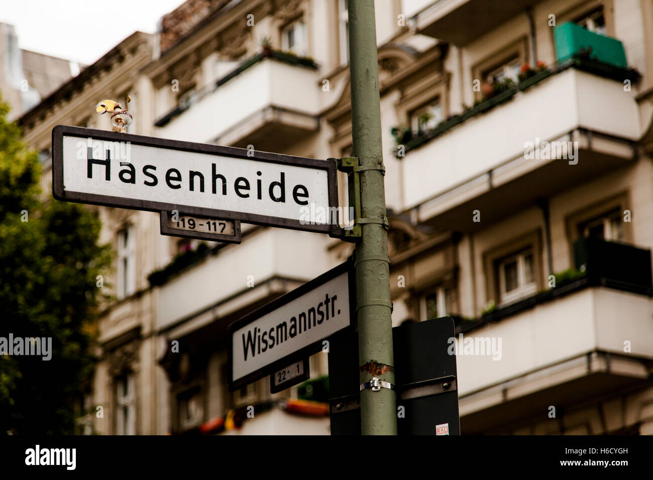 Street signs in an intersection says it is Hasenheide with ...
