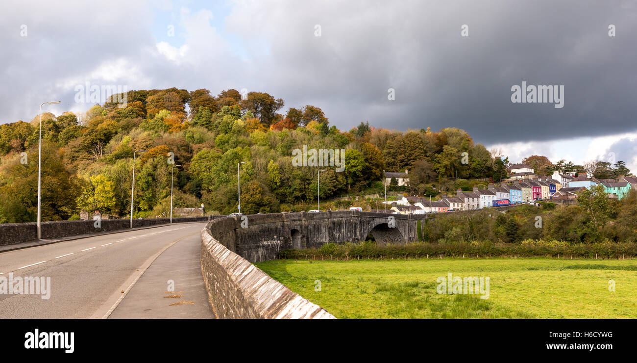 An autumnal view of Llandeilo with the bridge that crosses the river ...
