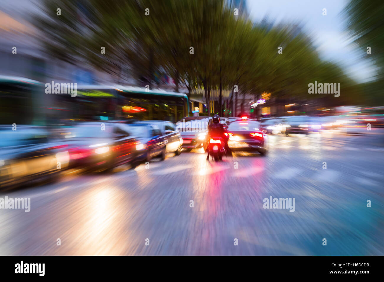 picture with camera made zoom effect of a city street scene with ...